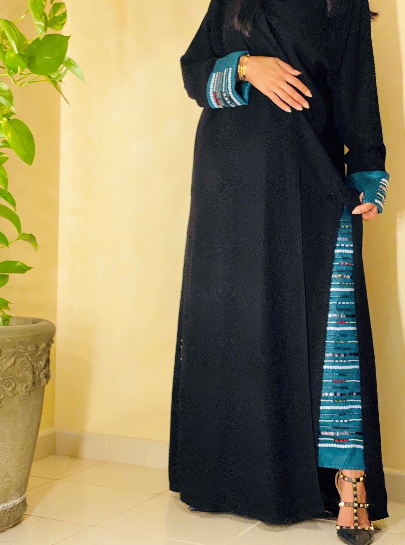 Colored Abaya Colorblock abaya featuring a contrast aqua sleeve cuff ...